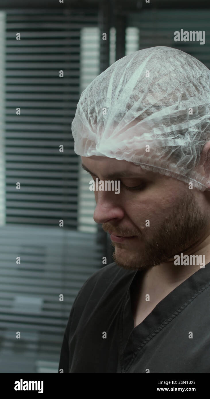 Vertical of Vet Wearing Cap and Mask before Medical Examination in ...