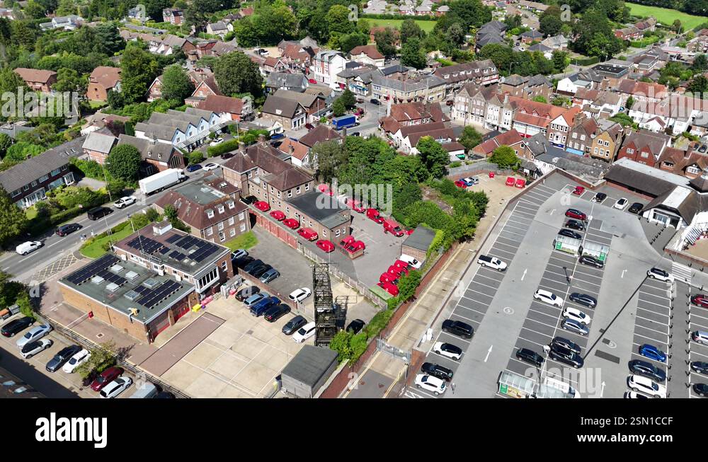 Red vans parked Post office yard Crowborough town in Kent UK drone ...