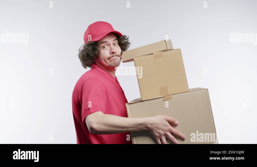 Postal courier man with heavy parcels boxes. Postman delivers address ...