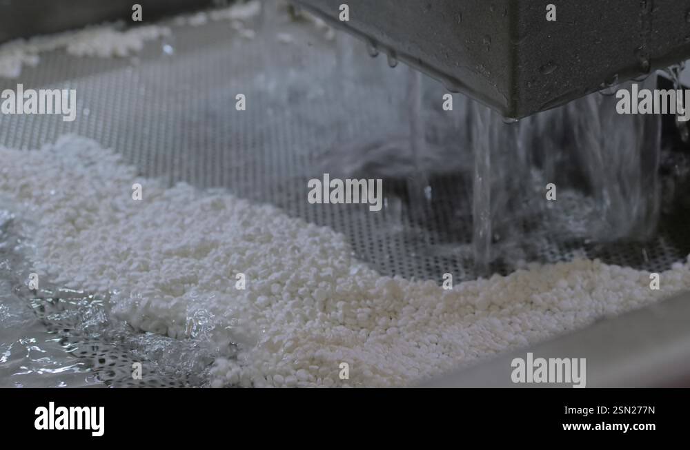 Water flow with plastic granules, pellets, recycling machine ...