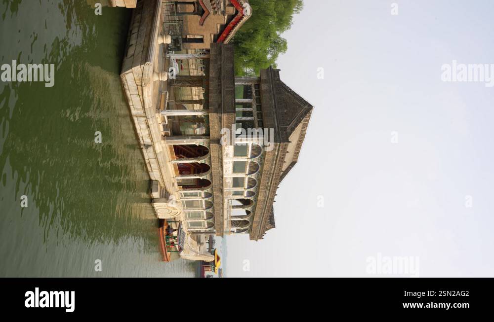 Marble Boat docked on the water at the Summer Palace, a symbol of ...