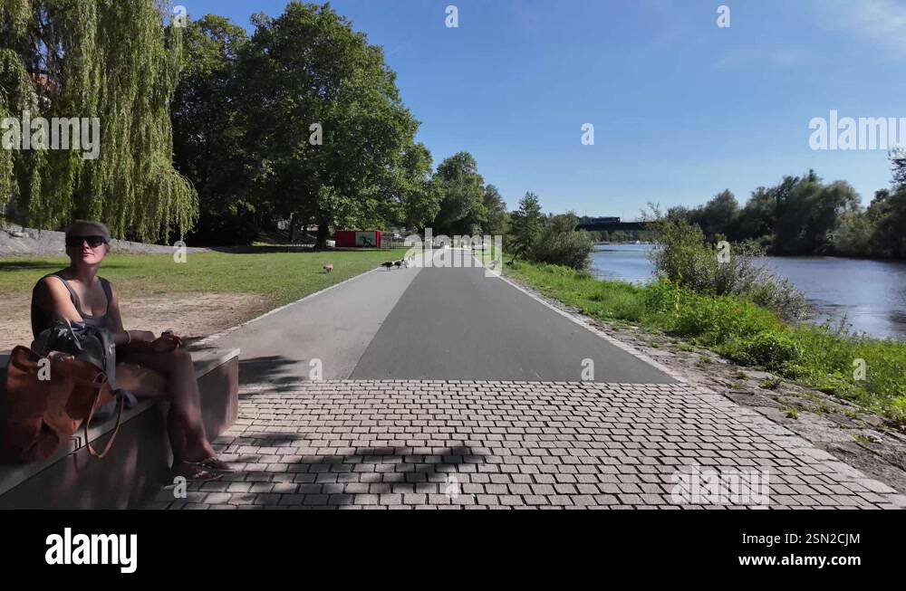 Aschaffenburg, Germany - 09/01/2024: Walking the promenade near river ...