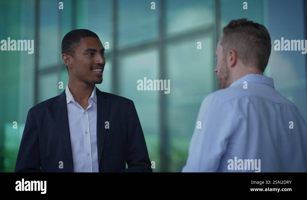 A business meeting is currently taking place in a modern and very Stock ...