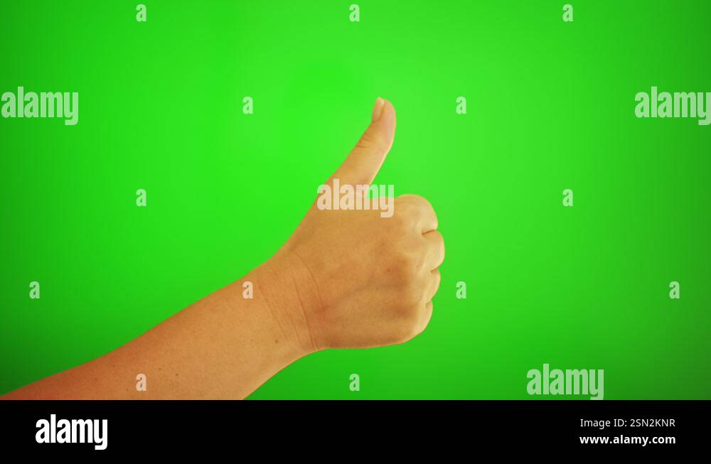 Hand show thumbs up gesture. Female hand do thumbs up . Like. Green ...