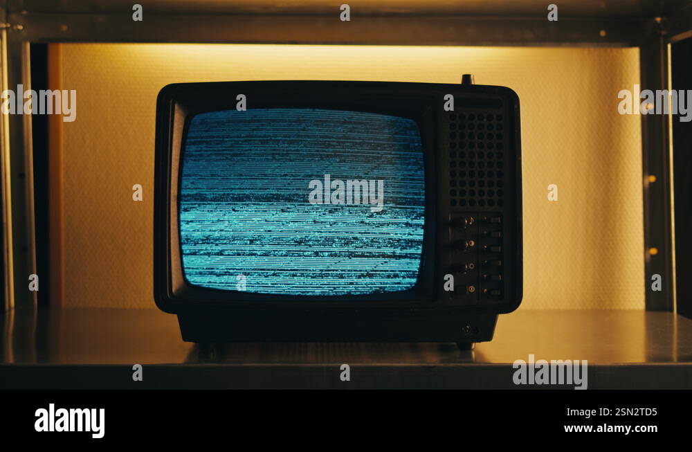 Retro TV, vintage television In a nostalgic setup, a retro TV displays ...