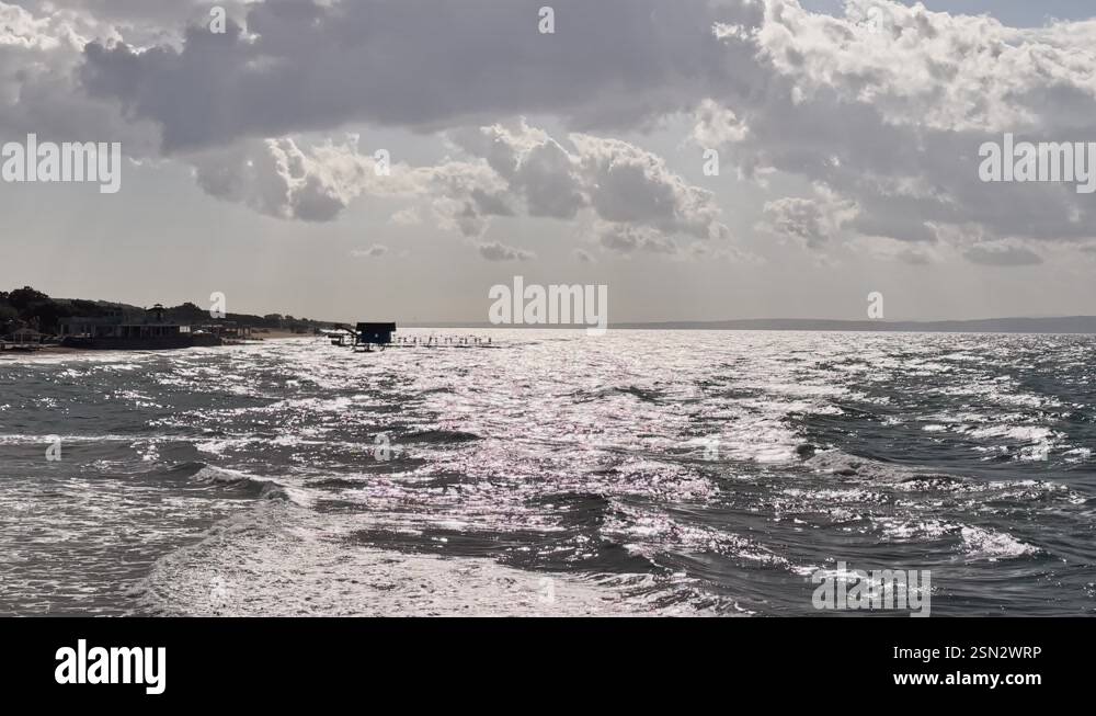 Cinematic sea and ocean waves glide across the sand Stock Video Footage ...
