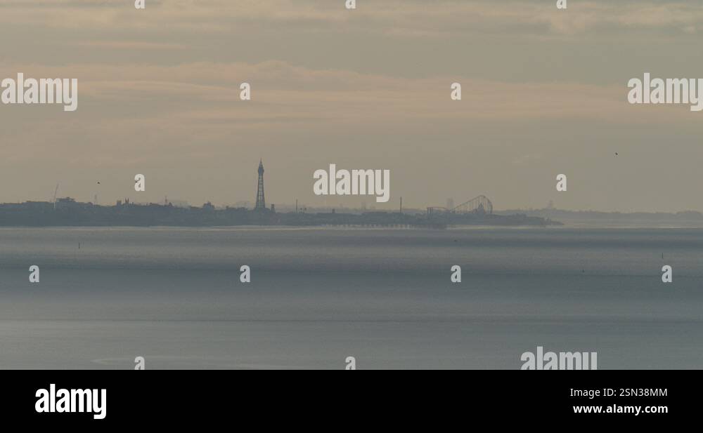 Blackpool tower across Morecambe Bay from moorland above the Duddon ...