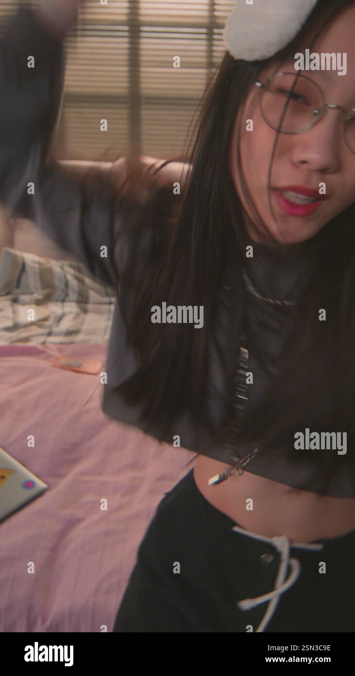 Korean Girl Looking at Camera while Dancing K-pop and Lip Syncing Stock ...