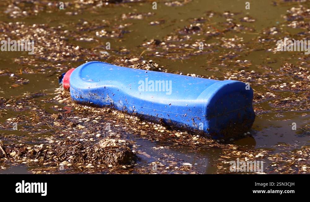 Plastic bottles garbage float in polluted lakes and rivers in Iran ...