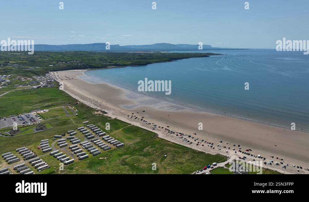 Rossnowlagh Beach, County Donegal, Ireland, June 2023. Drone pulls ...