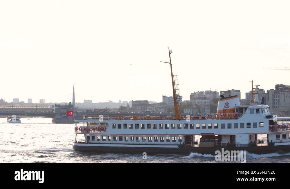 Famous ferries of Istanbul. Istanbul view with a ferry and Galata ...