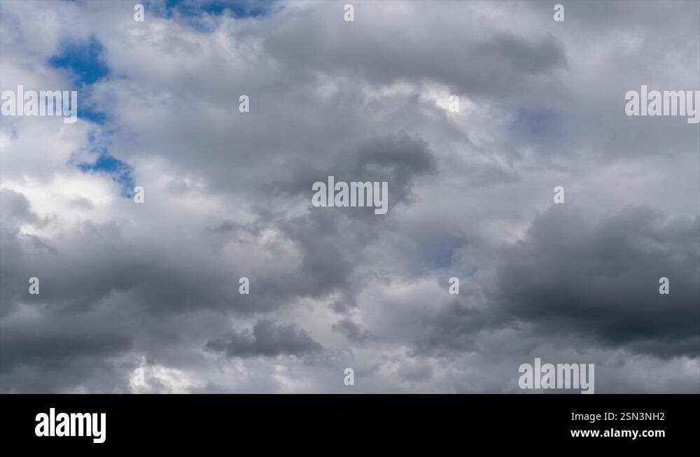 Time lapse of black clouds. The sky is cloudy and gray with black clouds Stock Video Footage - Alamy