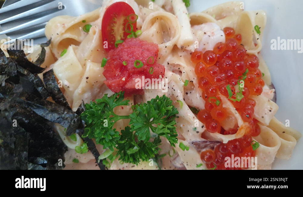 Pasta with salmon roe and mentaiko cod roe with seaweed and creamy ...
