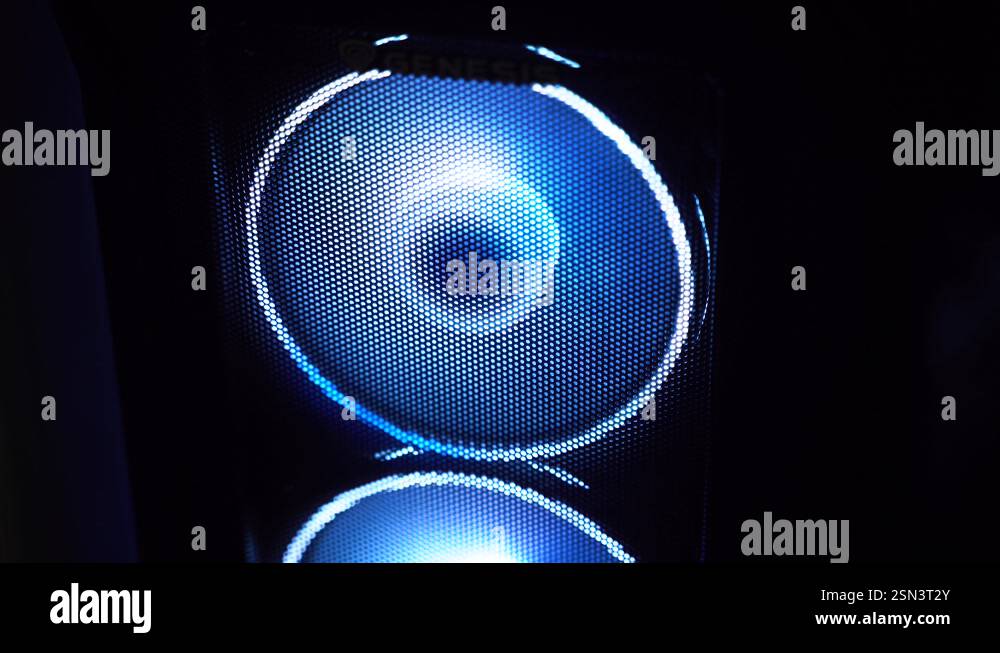 computer case with blue led backlight and rotating cooler in the dark ...