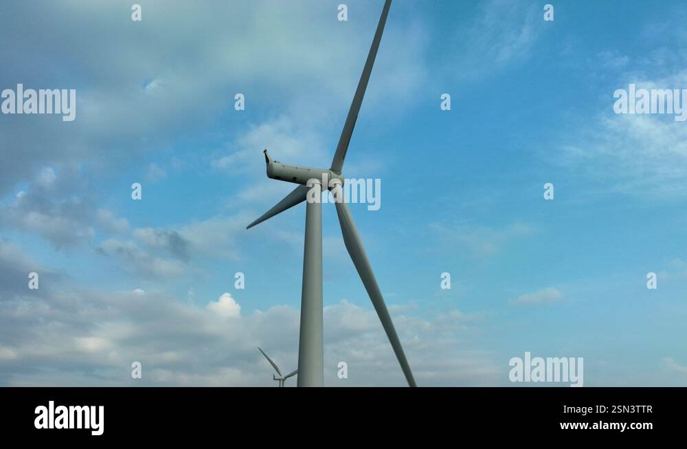 Drone captures rotating turbines producing renewable energy in Lista ...