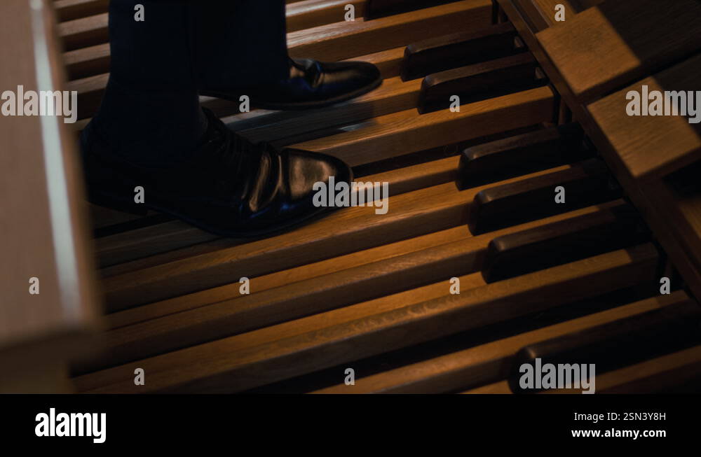 Feet of Unrecognisable Master Skilfully Playing Pedals on Church Organ ...