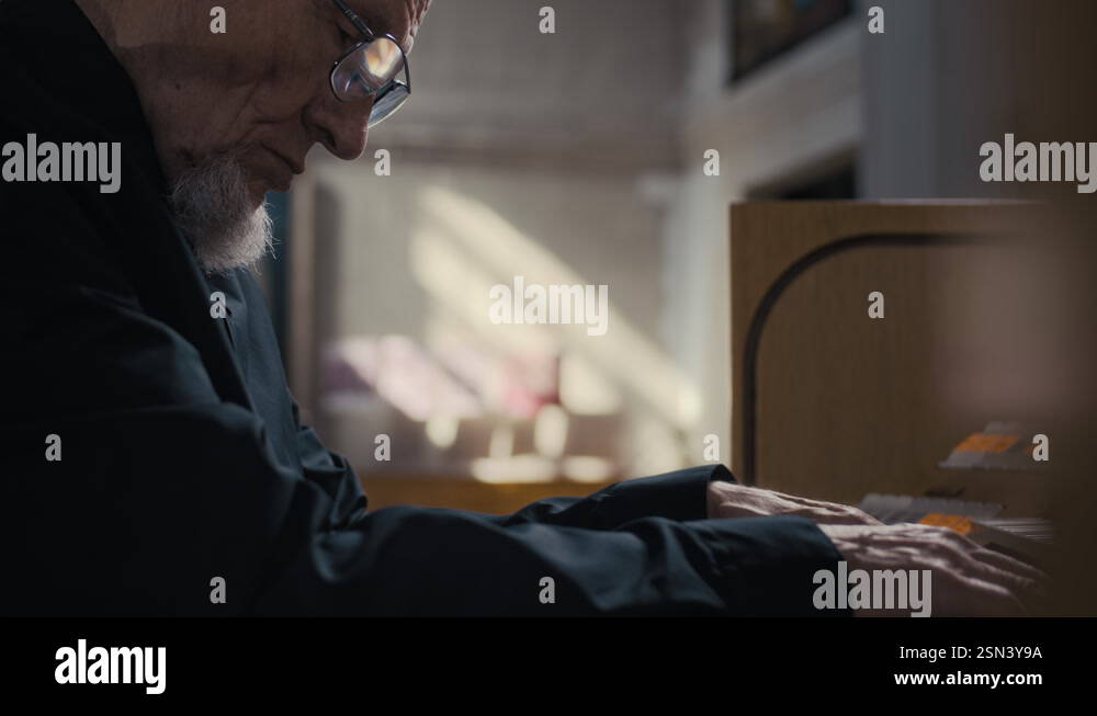 Grey-haired Elderly Organist Playing Organ Keyboard in Cathedral Stock ...