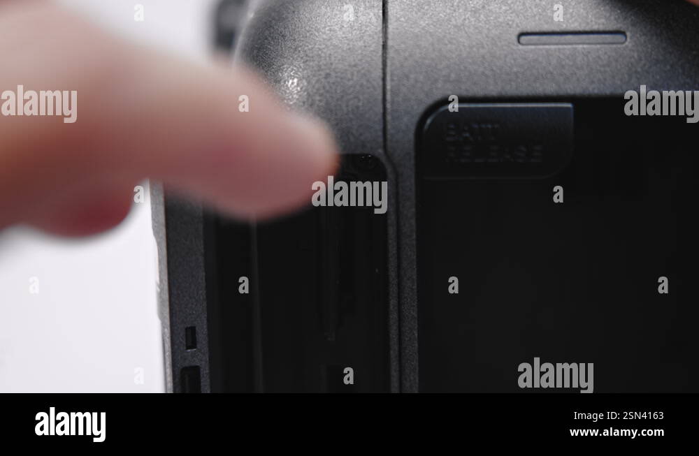ejecting memory card from video film camera Stock Video Footage - Alamy