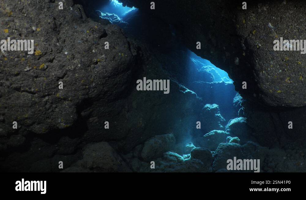 cave diving underwater scuba divers exploring caves Stock Video Footage - Alamy
