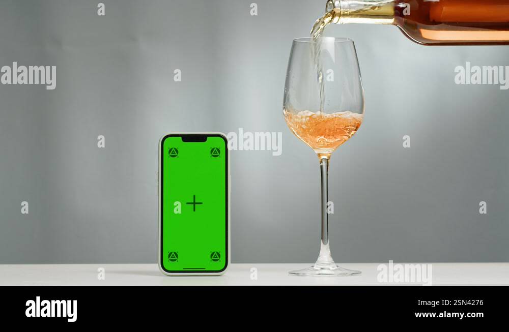 Rose Orange or white wine bottle and glass with chroma key green screen ...