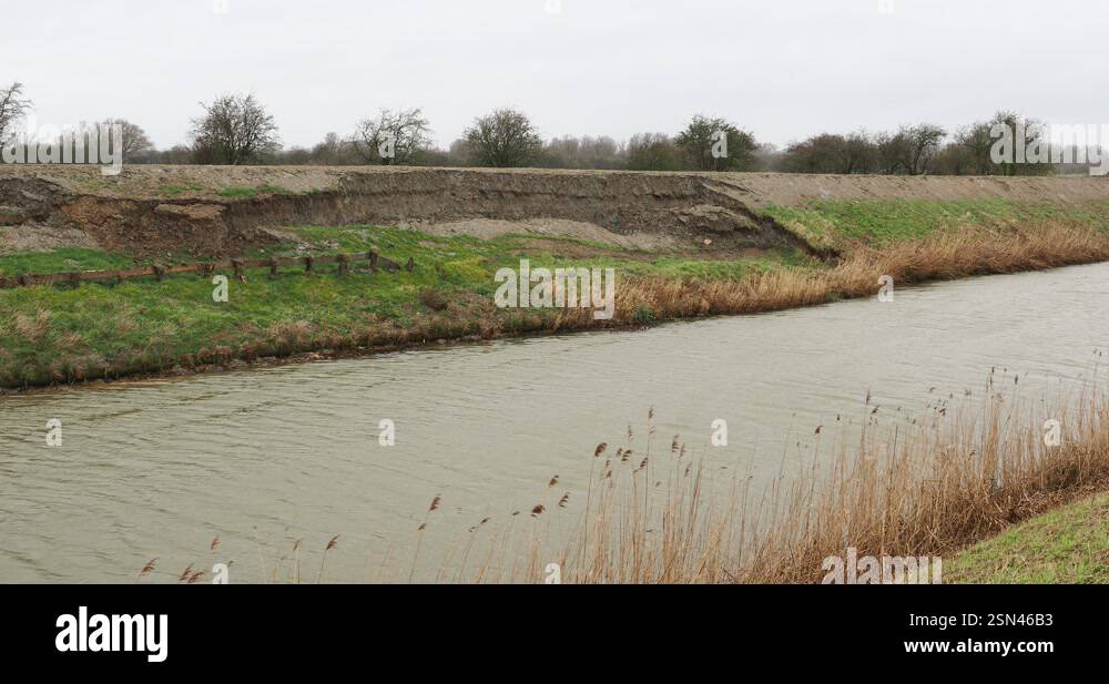 Damage caused by slumping to a flood barrier on the Sixteen Foot Drain ...