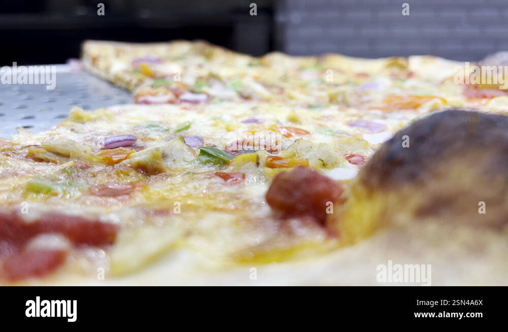 Old pizza kept warm for sale at restaurant 4k Stock Video Footage - Alamy