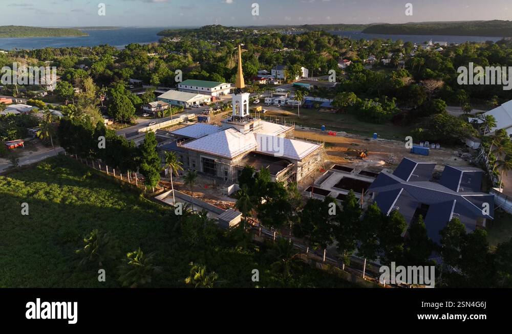 Tonga Temple in Neaifu town, Vava'u Island, Pacific. Drone pull back ...