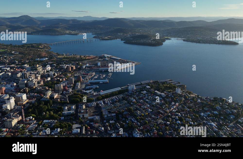 Hobart city at sunset with Tasman Bridge in background, Tasmania in ...