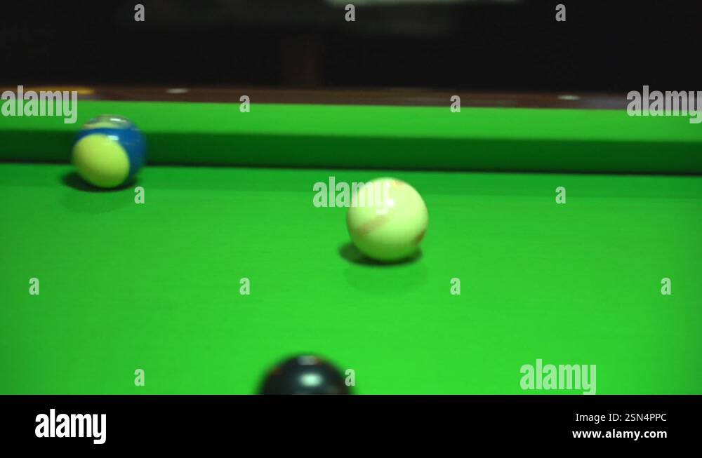 A close-up of a billiard ball getting into a pocket Stock Video Footage ...
