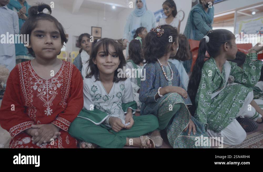 Lahore, Pakistan - 08/14/2024: A group of children dressed in ...