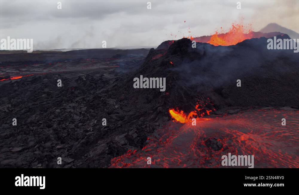 Super slow motion footage of volcanic lava flowing from an erupting ...