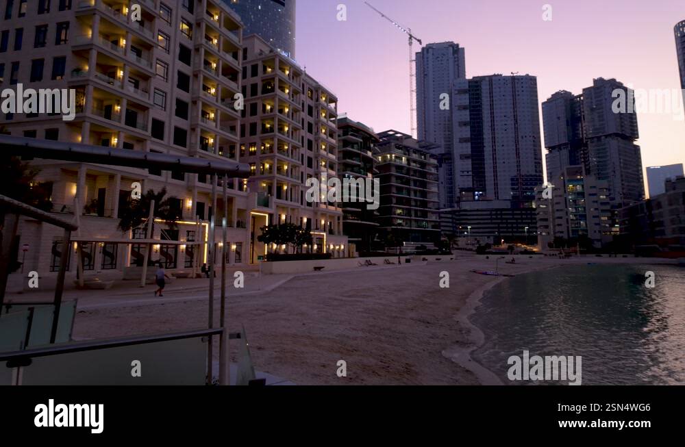 Al Reem Island Beach in Abu Dhabi, United Arab Emirates at dusk, sunset ...