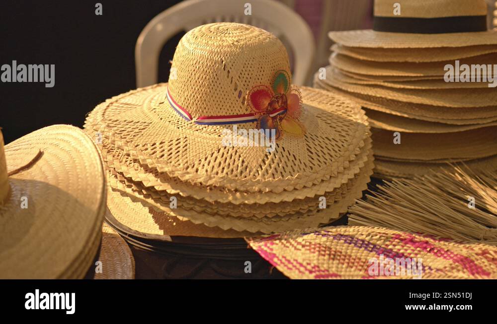 Street market exhibition of straw hats, also known as 'piri hat' in Stock Video Footage - Alamy