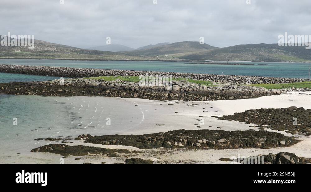The causeway connecting Eriskay to South Uist, Outer Hebrides, Scotland ...
