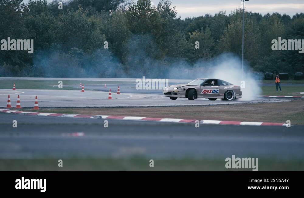 Japanese race car drifting in a circle on race track in slow motion 4K ...