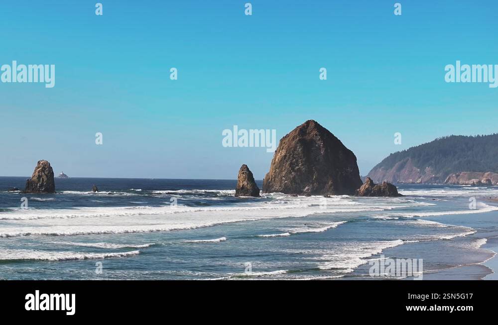 Basalt Formation Of Haystack Rock Rising On The Shores Of Cannon Beach ...