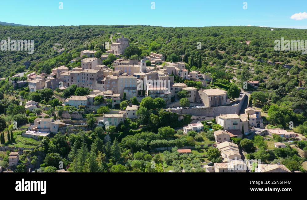 View of Simiane la Rotonde village in Provence, France. Simiane la ...