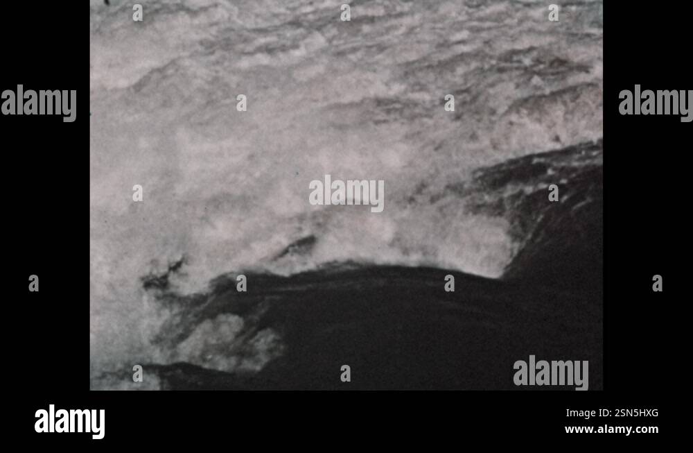 Egypt 1960s: Water flows from the Aswan Dam. Reservoir behind the dam ...