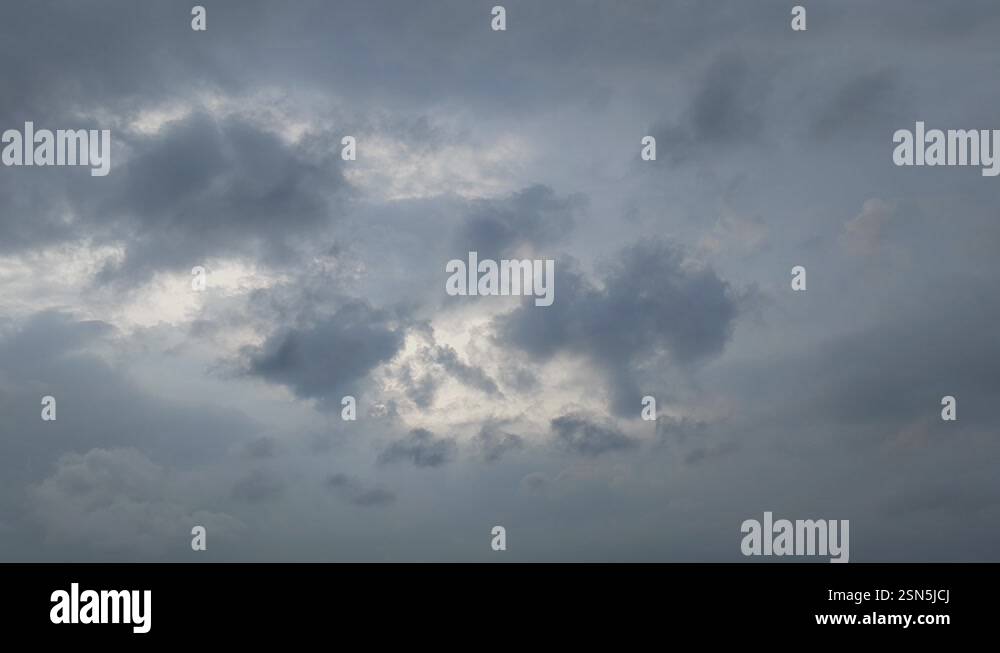 Overcast sky during the rainy season, with clouds slowly moving across ...