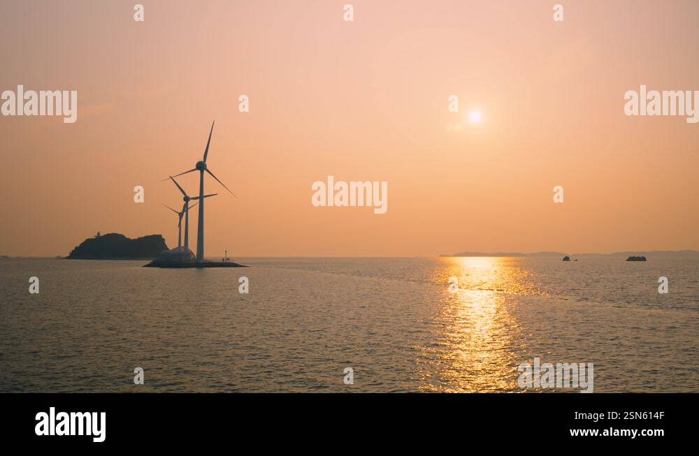 Offshore Wind Turbines in Tando Port Spinning at Golden Sunset Daebu ...