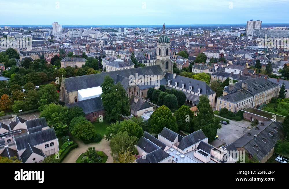 Notre-Dame-en-Saint-Melaine French abbey church over Thabor park ...