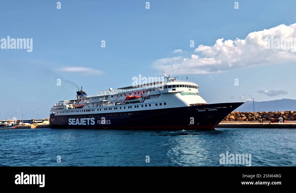 Crete, Greece - 10/01/2024: A large SeaJets ferry departs from the calm ...