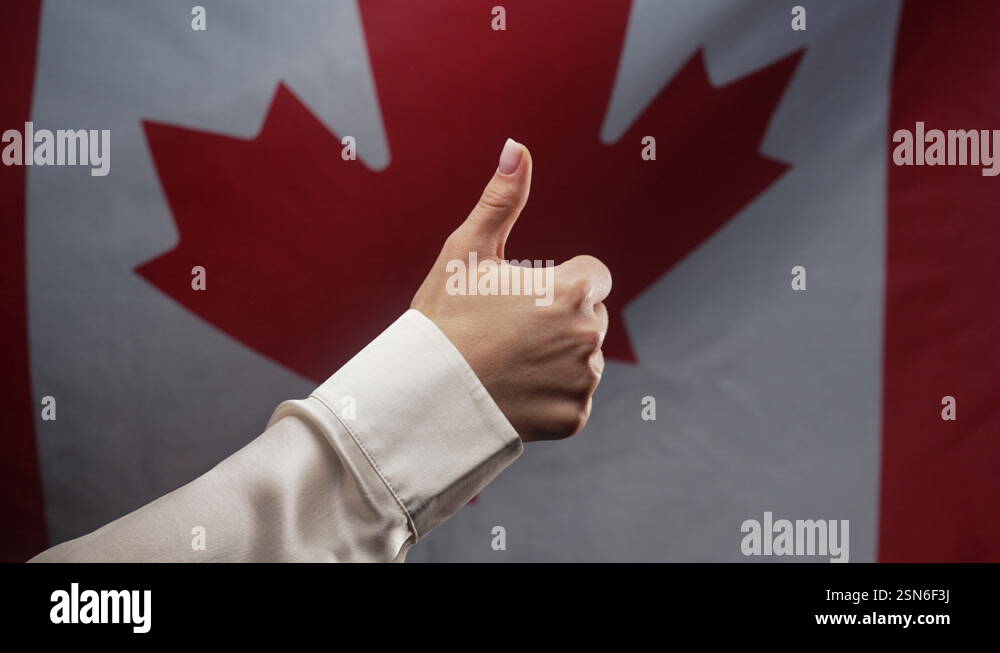 Woman Makes Hand Sign Like, Thumb Up Gesture on canadian flag ...