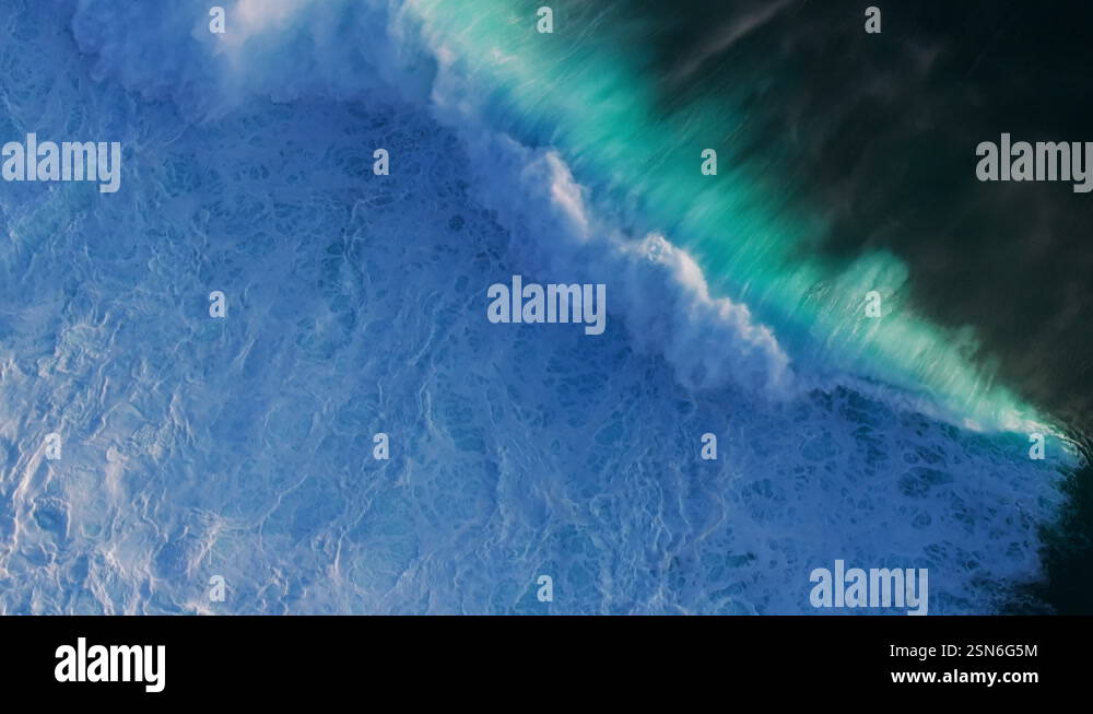 Gnarly wave crashing in slow motion at One Eye surf break, aerial top ...