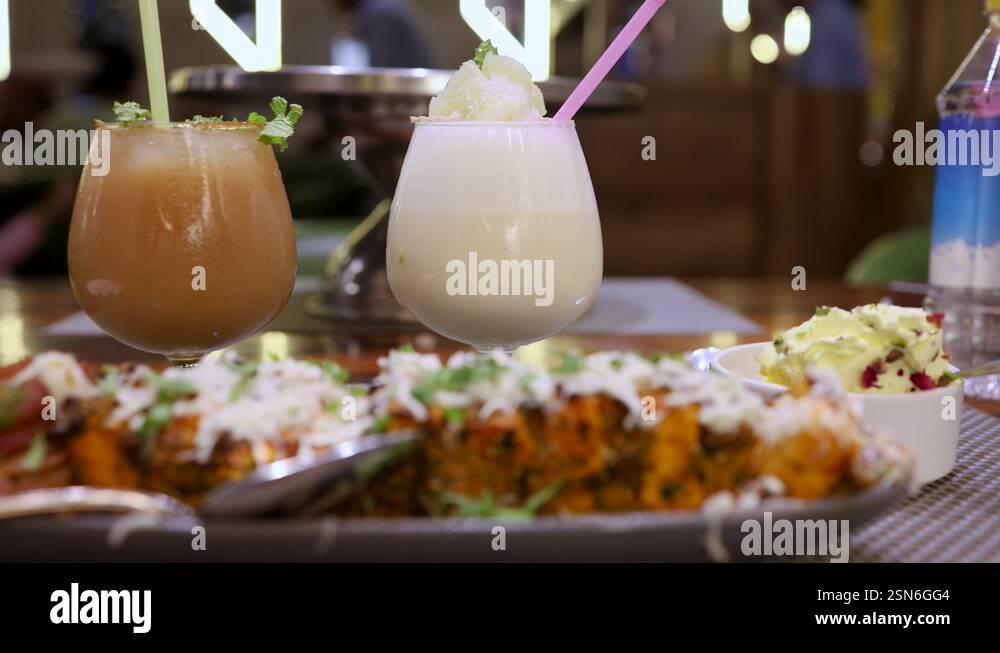 mocktail glass with healthy drink served at restaurant from flat angle ...