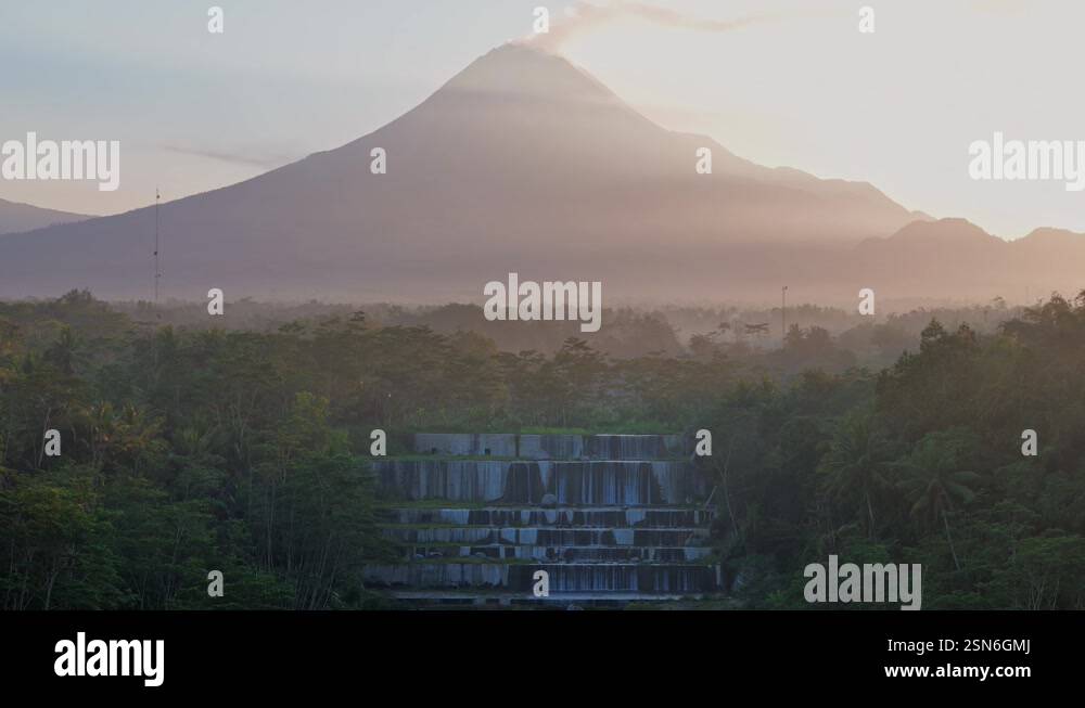 Aerial view of Air Terjun Watu Purbo with Merapi Mountain on the Stock ...