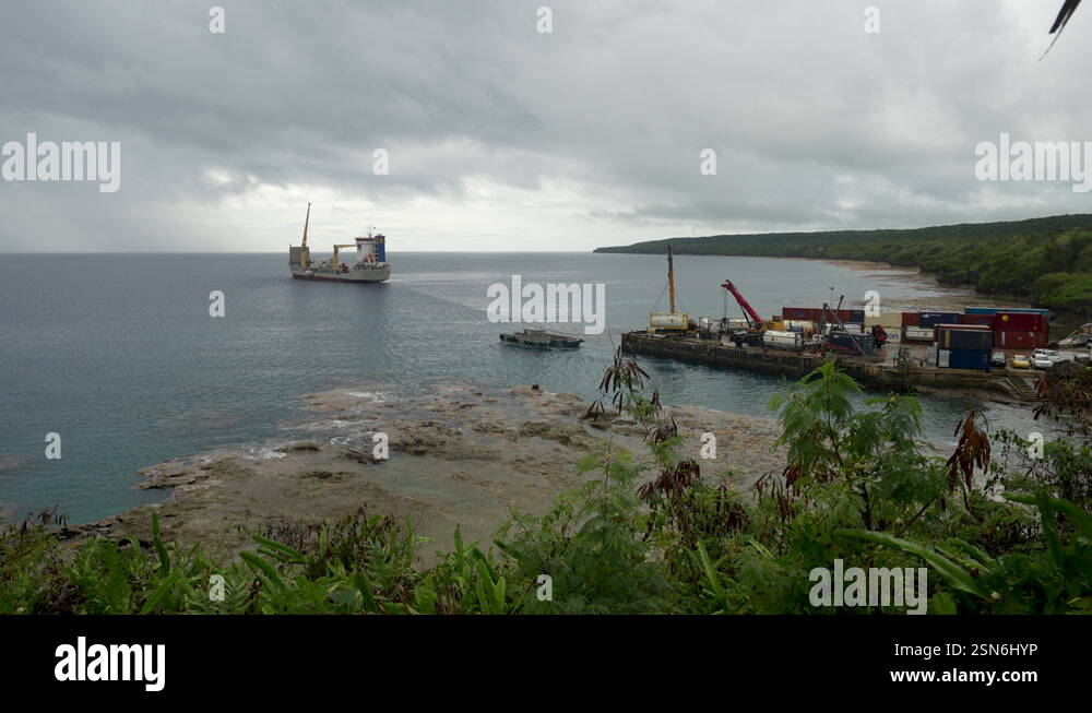 A shipping container offloading supplies at the port of Niue in the ...