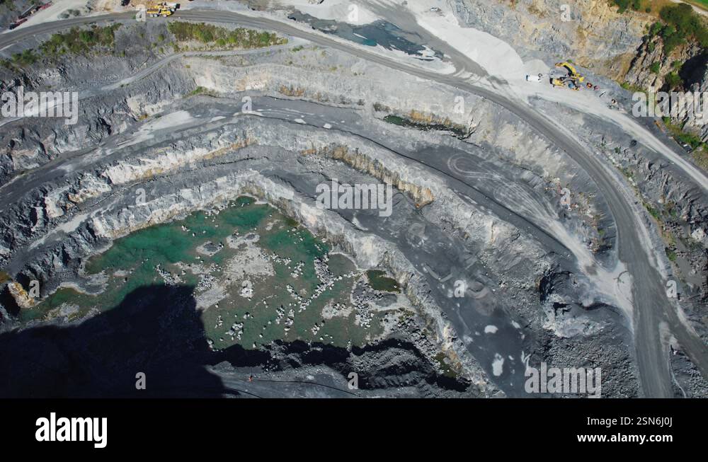 Open cast mine deep sides and roads leading to the bottom of the ...