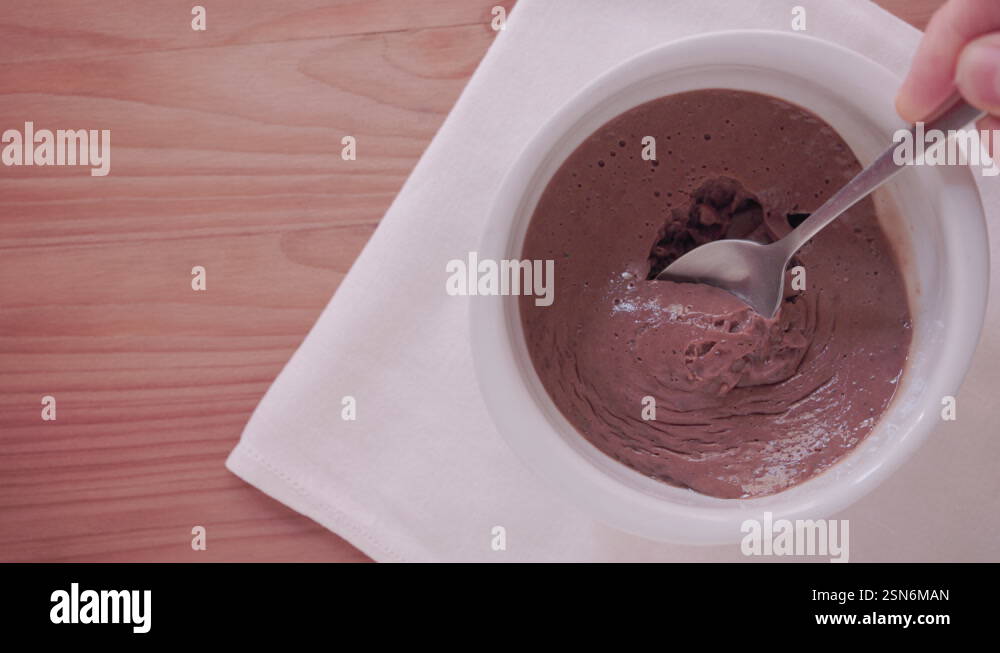 Eating chocolate pudding Stock Video Footage - Alamy
