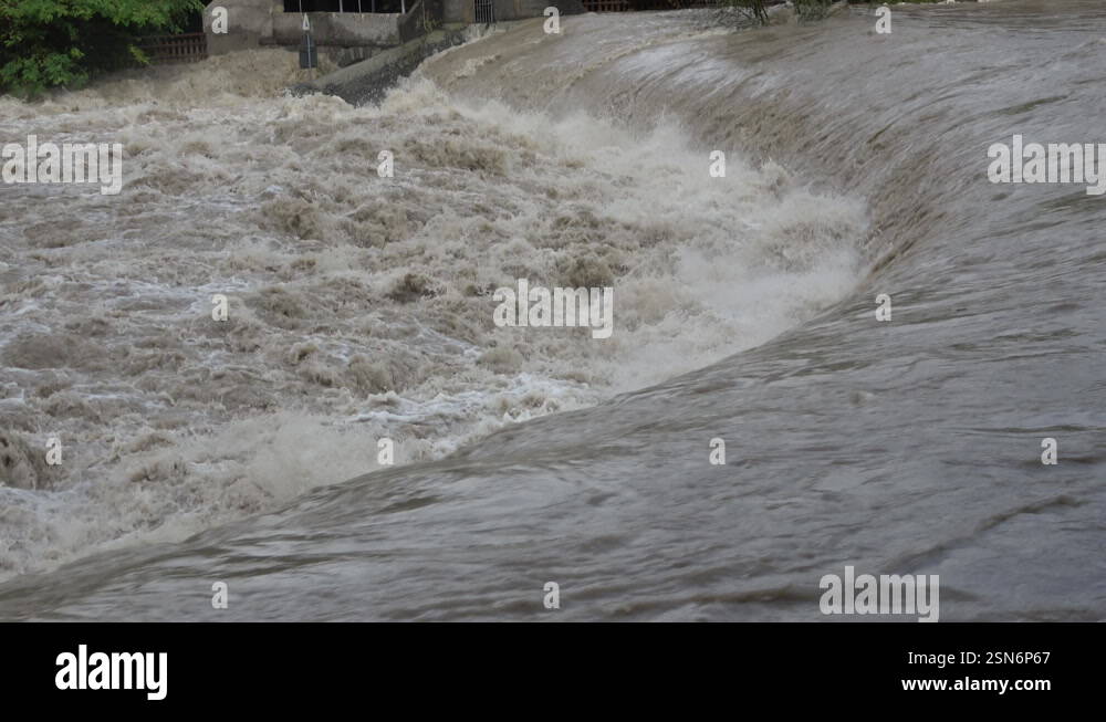 The river swollen after heavy rainfall. General contest of a river in ...